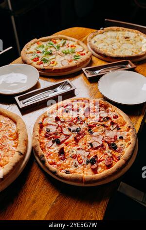 Assorted pizza slices. Margherita, pepperoni, four cheese pizza. Top ...