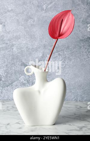 Beautiful tail flower in vase on marble table. Space for text Stock ...