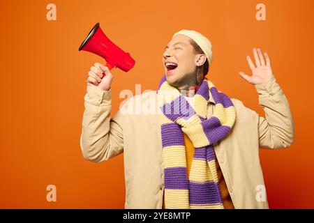 Young Man Expresses Joy and Enthusiasm Against a Bright Blue Background ...