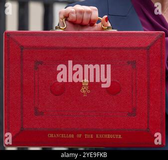 Chancellor of the Exchequer Rachel Reeves holds the red despatch box ...