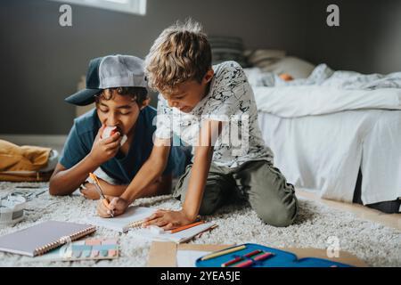 boy in his bedroom doing his homework Stock Photo - Alamy