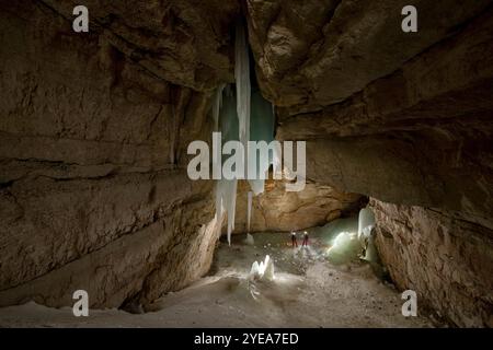 People from University of Innsbruck, standing inside an illuminated ice ...