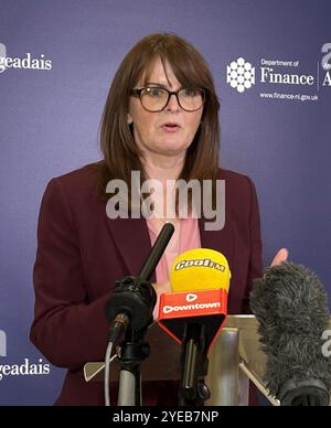 Finance Minister Caoimhe Archibald speaks to reporters at her ...
