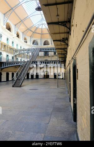 Main hall and metal stairway in Kilmainham Gaol prison, Dublin, Ireland ...