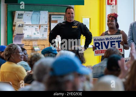 Genesee County Sheriff Chris Swanson talks with an inmate at the county ...