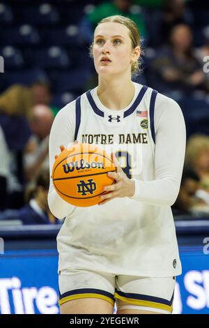 Notre Dame forward Kate Koval (13) fouls Miami forward Cameron Williams ...