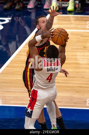 Atlanta Hawks guard Garrison Mathews (24) passes the ball while under ...