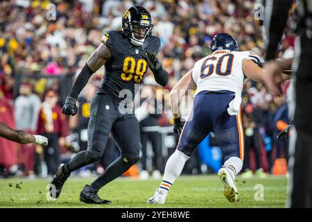 Washington Commanders defensive end Clelin Ferrell (99) rushes during ...