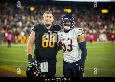 Washington Commanders guard Michael Deiter (60) lines up during an NFL ...