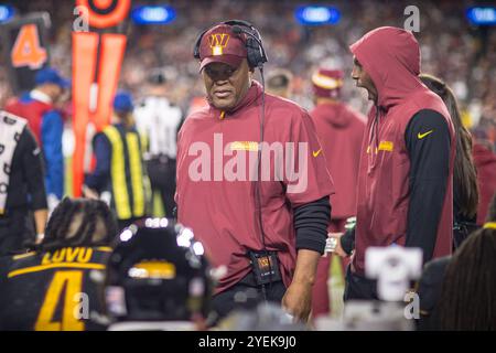 Washington Commanders linebackers coach Ken Norton Jr., walks onto the ...
