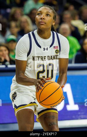 Notre Dame forward Liatu King, lrft, dribbles past North Carolina guard ...