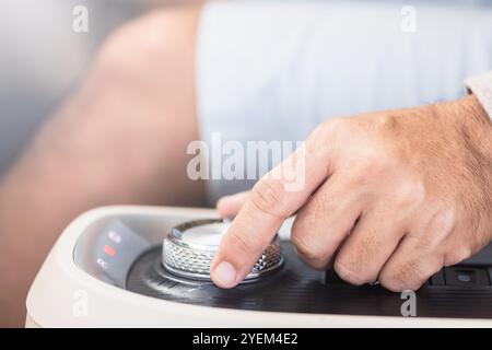 Hand rotating the gear selector in an electric vehicle, EV transmission ...