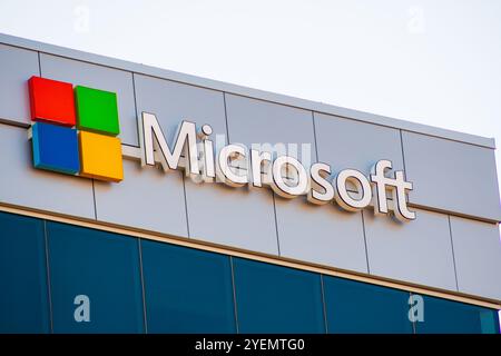 Microsoft sign and logo on the facade of corporation campus in Silicon ...