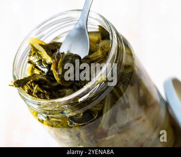 Glass jar with pickled swiss chard Stock Photo - Alamy