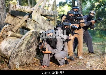 Tactical paintball team fighting on outdoor location Stock Photo - Alamy