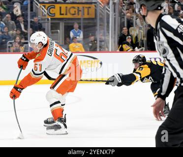 Anaheim Ducks left wing Cutter Gauthier (61) passes the puck during the ...