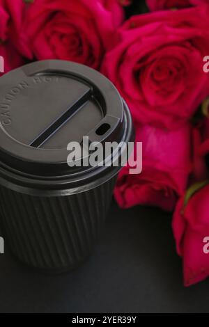 Cups of coffee and pink roses on white background Stock Photo - Alamy