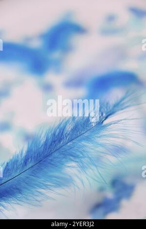 White Fluffy Feather on Pastel beige background. Ethereal Pink Fluffy ...