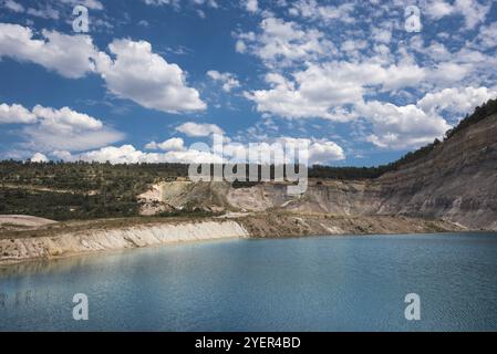 Turqoise lake in an open pit mine Stock Photo - Alamy