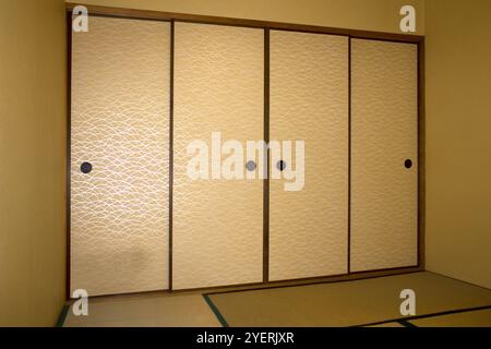 Fusuma (sliding door) and tatami in a closet in a Japanese-style room ...