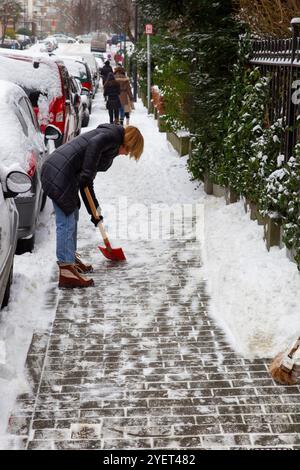 Clearing snow from pavement Stock Photo - Alamy