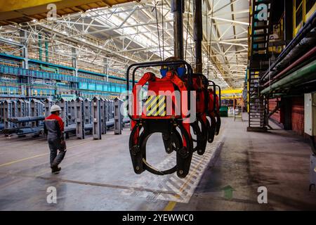 Working overhead crane in metalworking factory Stock Photo - Alamy