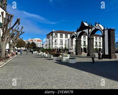 City gates and cobbled square in Ponta Delgada, São Miguel Island ...