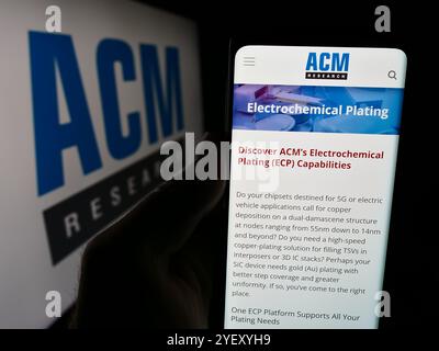 In this photo illustration, a cellphone with the webpage of Instituto ...