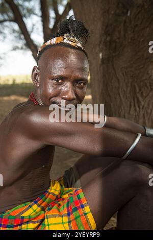 Young south east man smiling confident walking at street Stock Photo ...