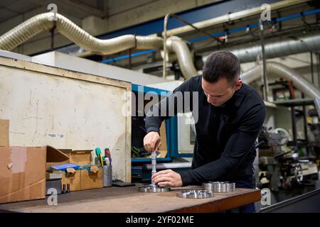 Cnc milling machine creating metal parts in modern factory Stock Photo ...