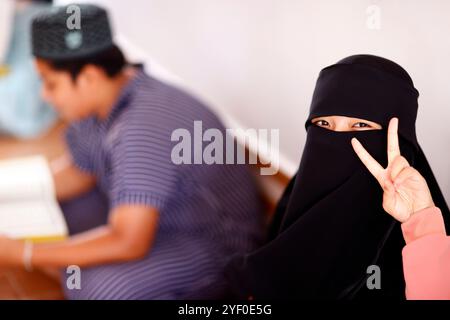 Islamic school. Students studying he Holy Quran. Vietnam Stock Photo ...