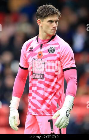 Sheffield United goalkeeper Michael Cooper makes a save during the Sky ...