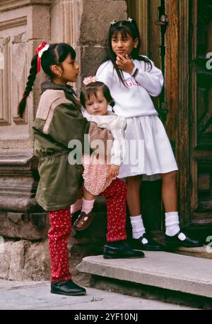 Young girls at Basilica entrance, Guanajuato, Mexico Stock Photo - Alamy