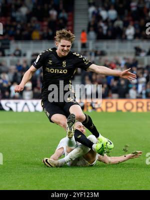 Coventry City's Jack Rudoni (left) and Preston North End's Ryan Ledson ...