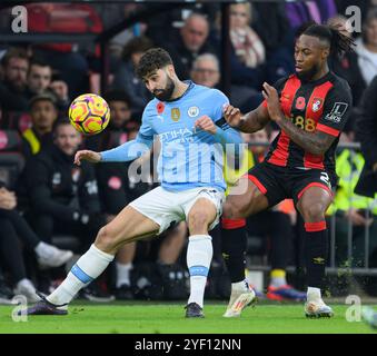 Manchester City's Josko Gvardiol, left, and Al Ain's Adis Jasic battle ...