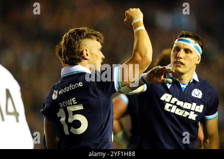 Scotland's Kyle Rowe celebrates scoring his side's first try of the ...