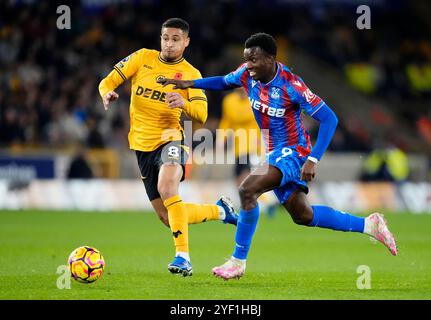 Wolverhampton Wanderers' Joao Gomes (left) celebrates scoring their ...