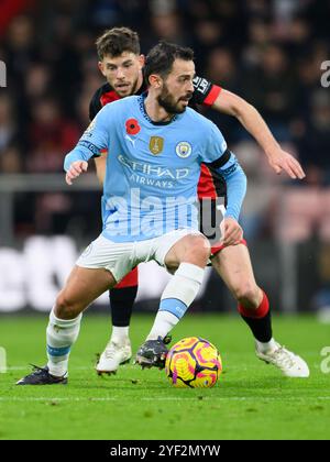 Manchester City's Bernardo Silva, right, takes a shot as Juventus ...