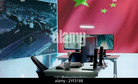 Empty monitoring room equipped with the chinese flag on big screen ...