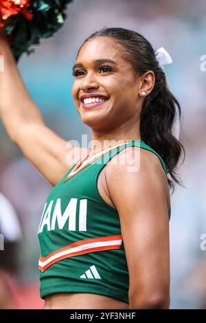 Miami, FL: One of the Miami Hurricanes cheerleaders entertains the fans ...