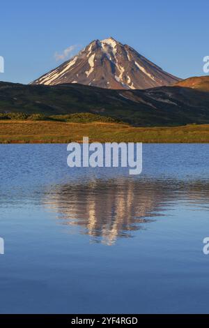 Stunning autumn volcano landscape of Kamchatka Peninsula at sunset ...
