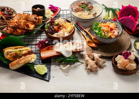 Assorted indonesian food set- nasi goreng, Rendang Pork, satay, bakso ...