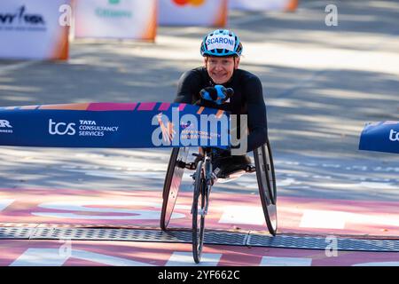 Susannah Scaroni of the United States crosses the line in second place ...
