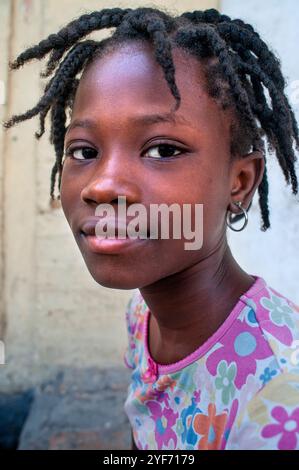 Portrait of a haitian nice girl in the historic colonial old town ...