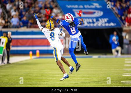 SMU wide receiver Jordan Hudson (2) catches a pass and is tackled by ...