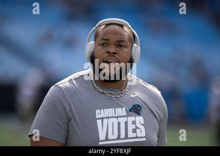 Carolina Panthers guard Robert Hunt (50) looks for someone to block ...