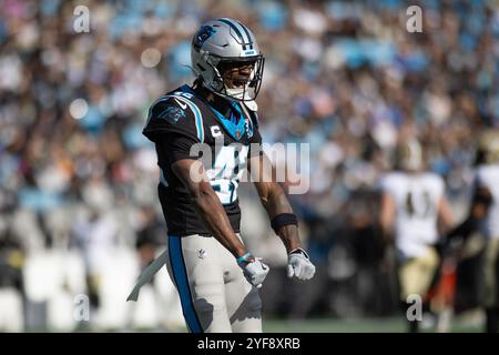 Carolina Panthers safety Sam Franklin Jr. (42) signs an autograph as he ...
