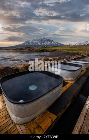 Hauganes Geothermal hot tubs with a view of Icelandic mountains and ...
