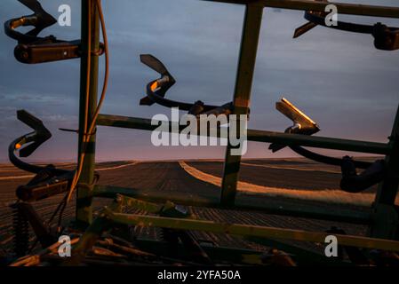 Large-scale dryland farm fields with a heavy equipment plow Stock Photo ...