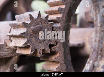 Details of a parts the moving parts of a rusty machine mechanical gear ...